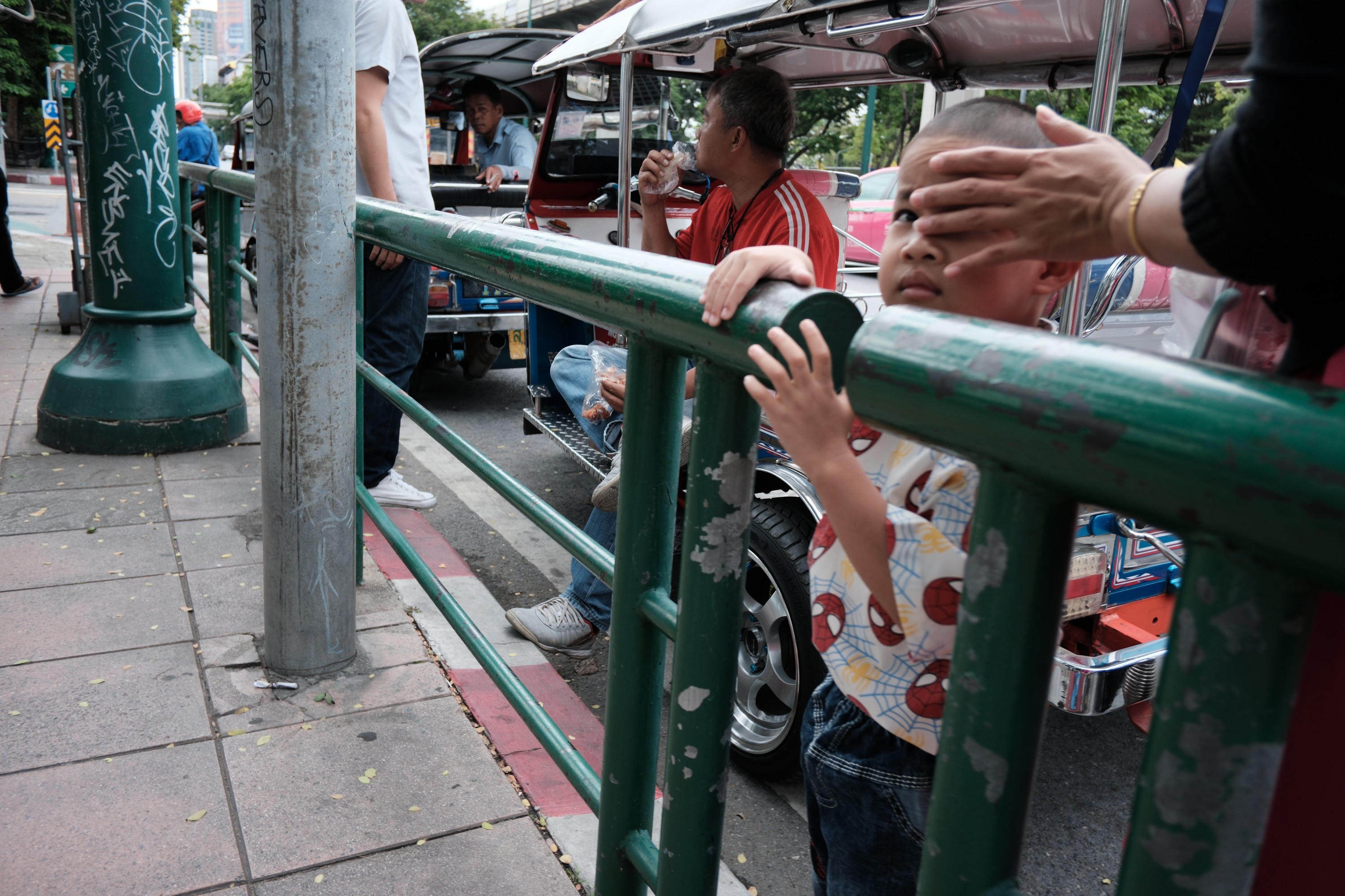 Boy by tuk-tuks, Bangkok, Thailand – gsworldphoto
